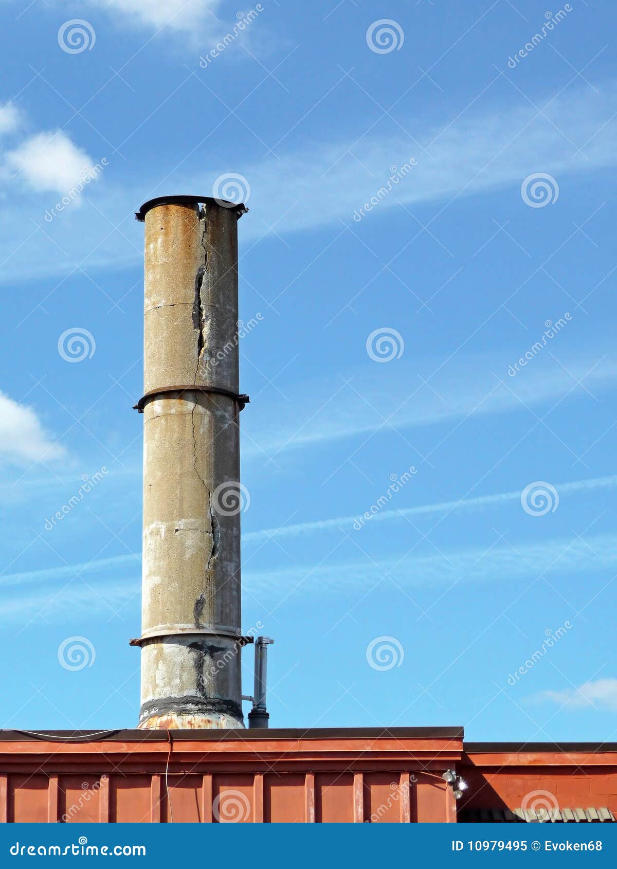 Crumbling Concrete Smokestack Against a Blue Sky Stock Image - Image of ...