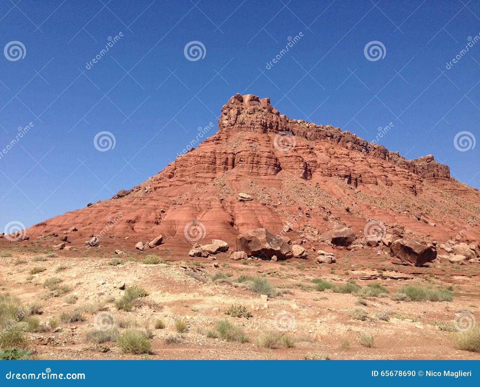 Crumbling Mountains in the Desert Stock Photo - Image of grass, reddish ...