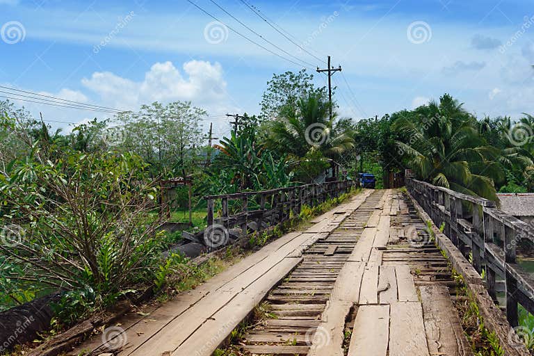 Crumbling tropical bridge stock image. Image of collapsing - 11039783