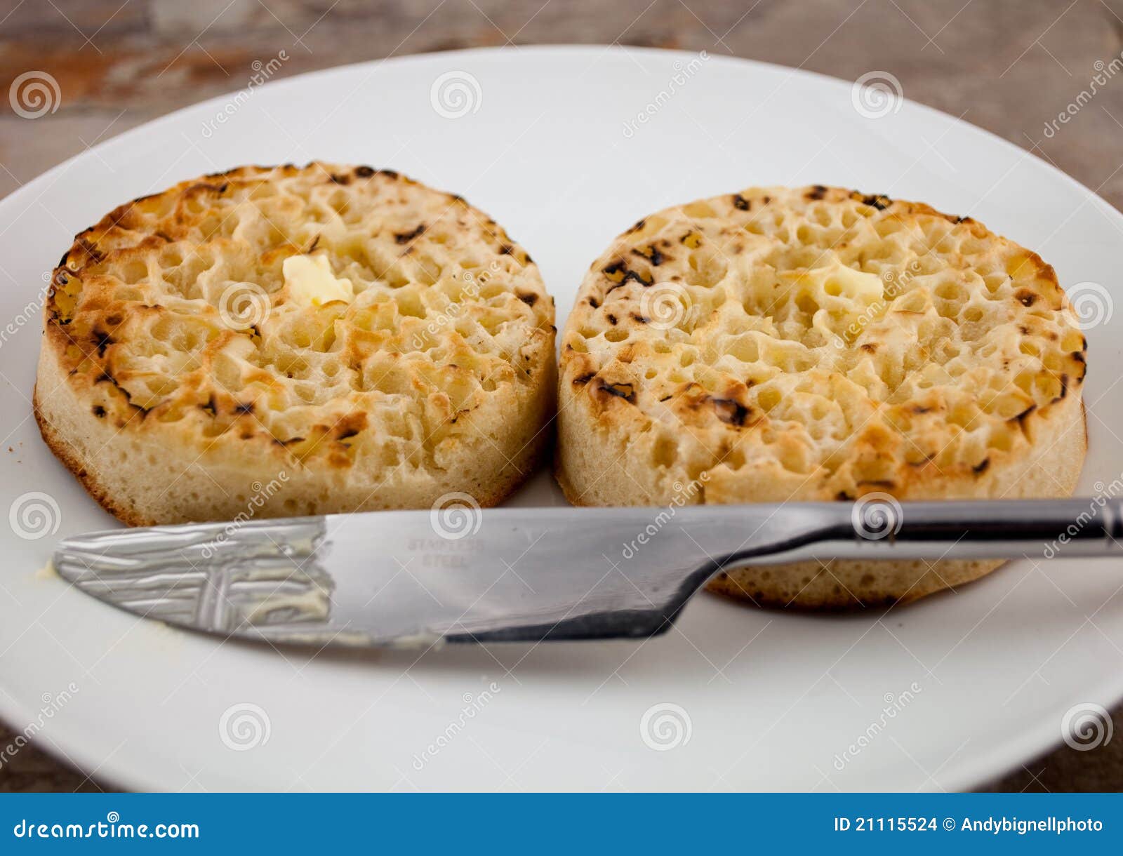 Crumpets with butter stock photo. Image of breakfast - 21115524