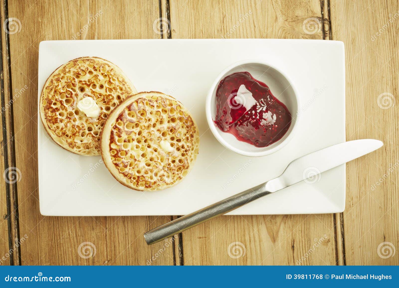 Crumpets Toasted on White Dish Stock Photo - Image of cutlery ...