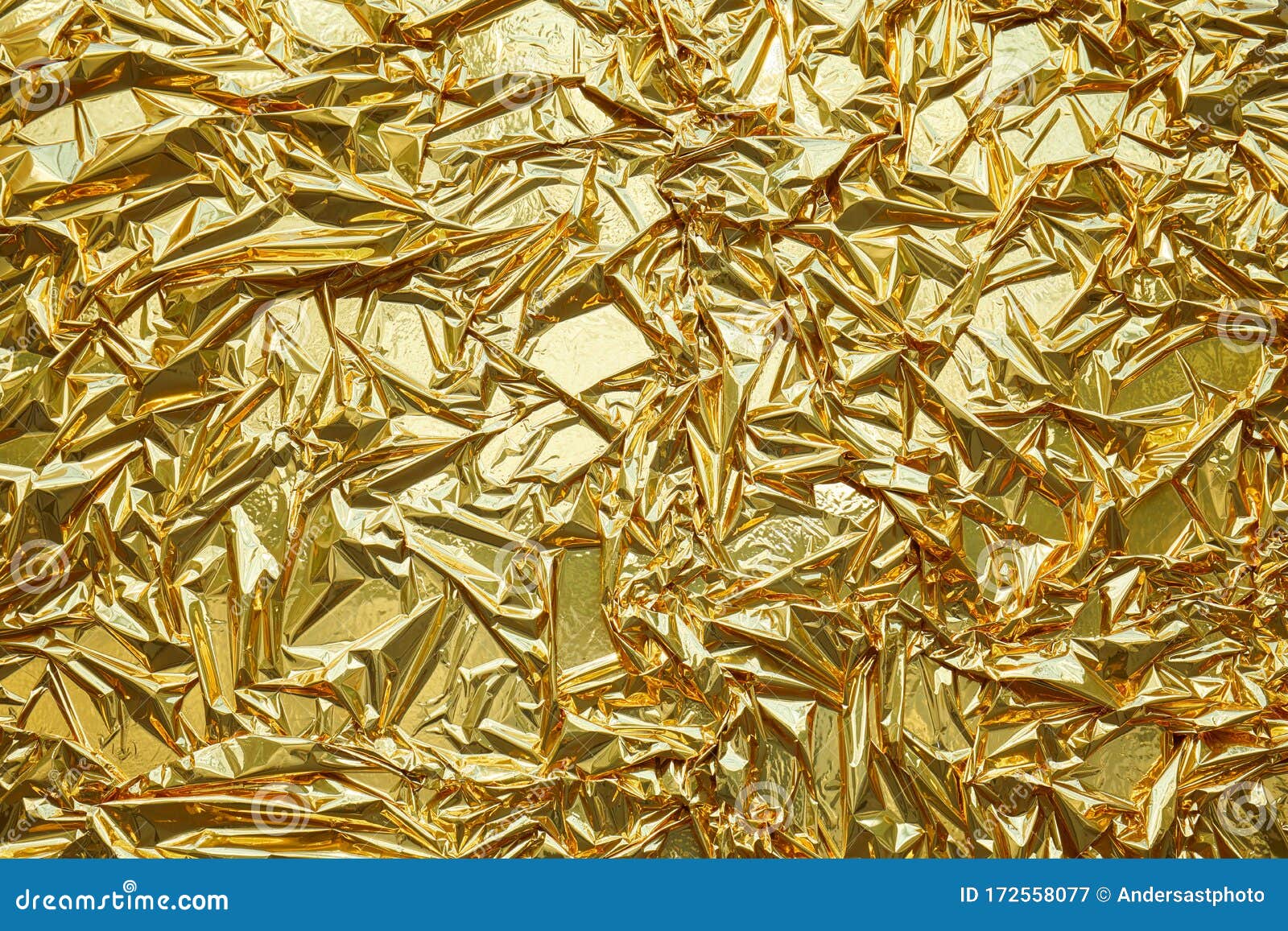 Crumpled Gold Foil Texture With Reflective Metallic Surface. Royalty ...