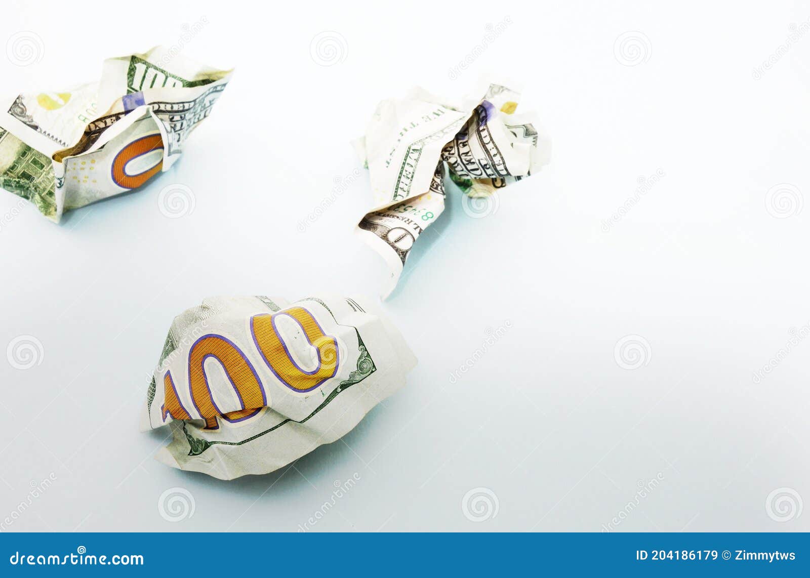 Crumpled Hundred Dollar Bills on Blue Stock Image - Image of crunched ...