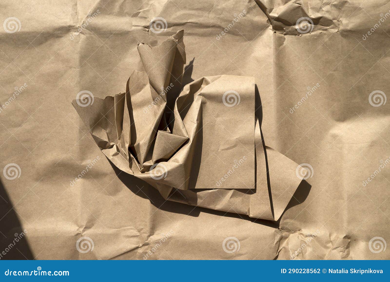 Crumpled Kraft Paper Lies on the Surface Stock Photo - Image of sheet ...