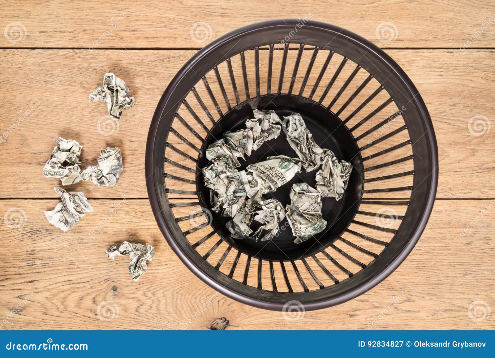 Crumpled money in trash stock image. Image of depression - 92834827