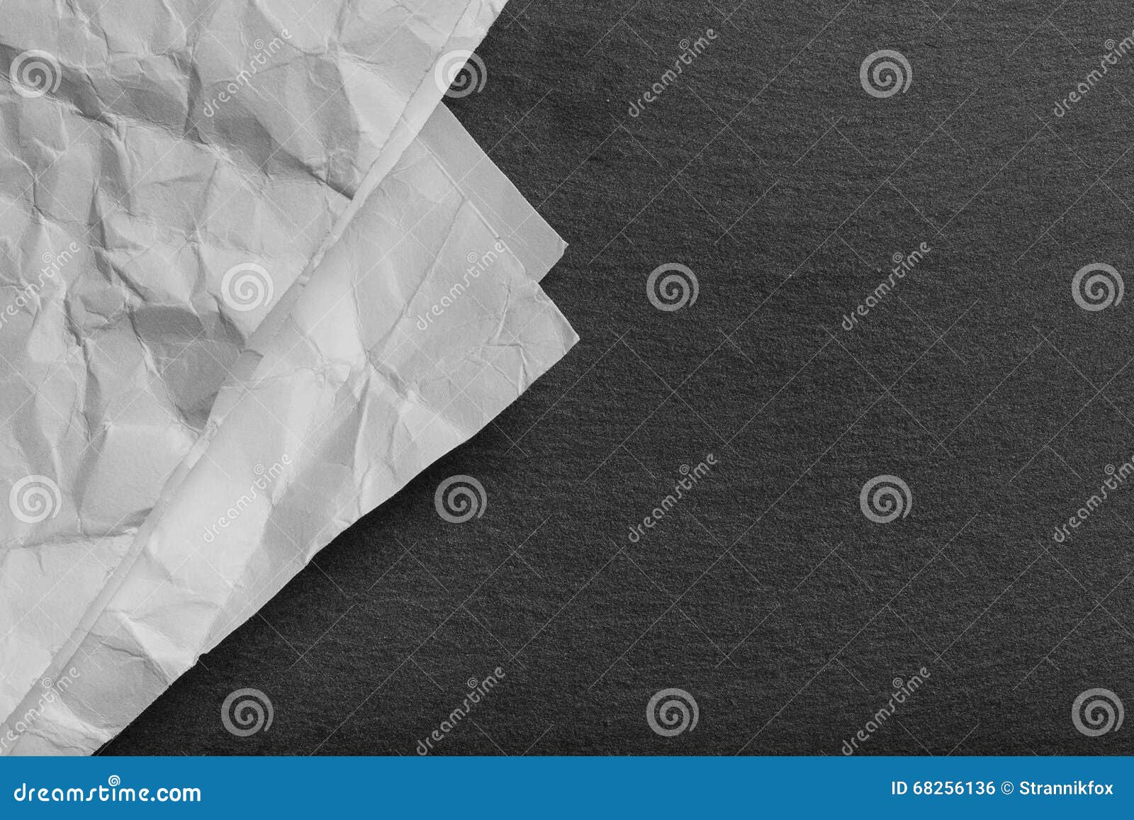 Crumpled Paper on Black Slate Cutting Board Stock Photo - Image of ...