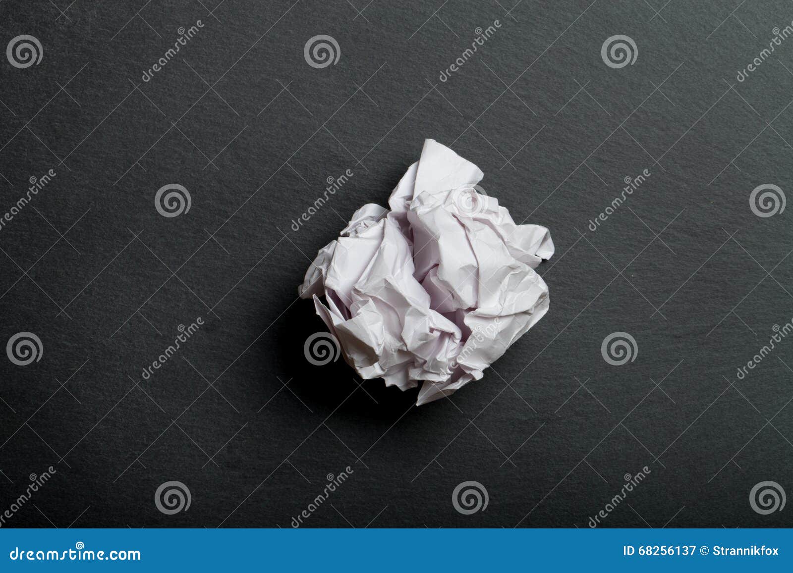 Crumpled Paper on Black Slate Cutting Board Stock Image - Image of ...
