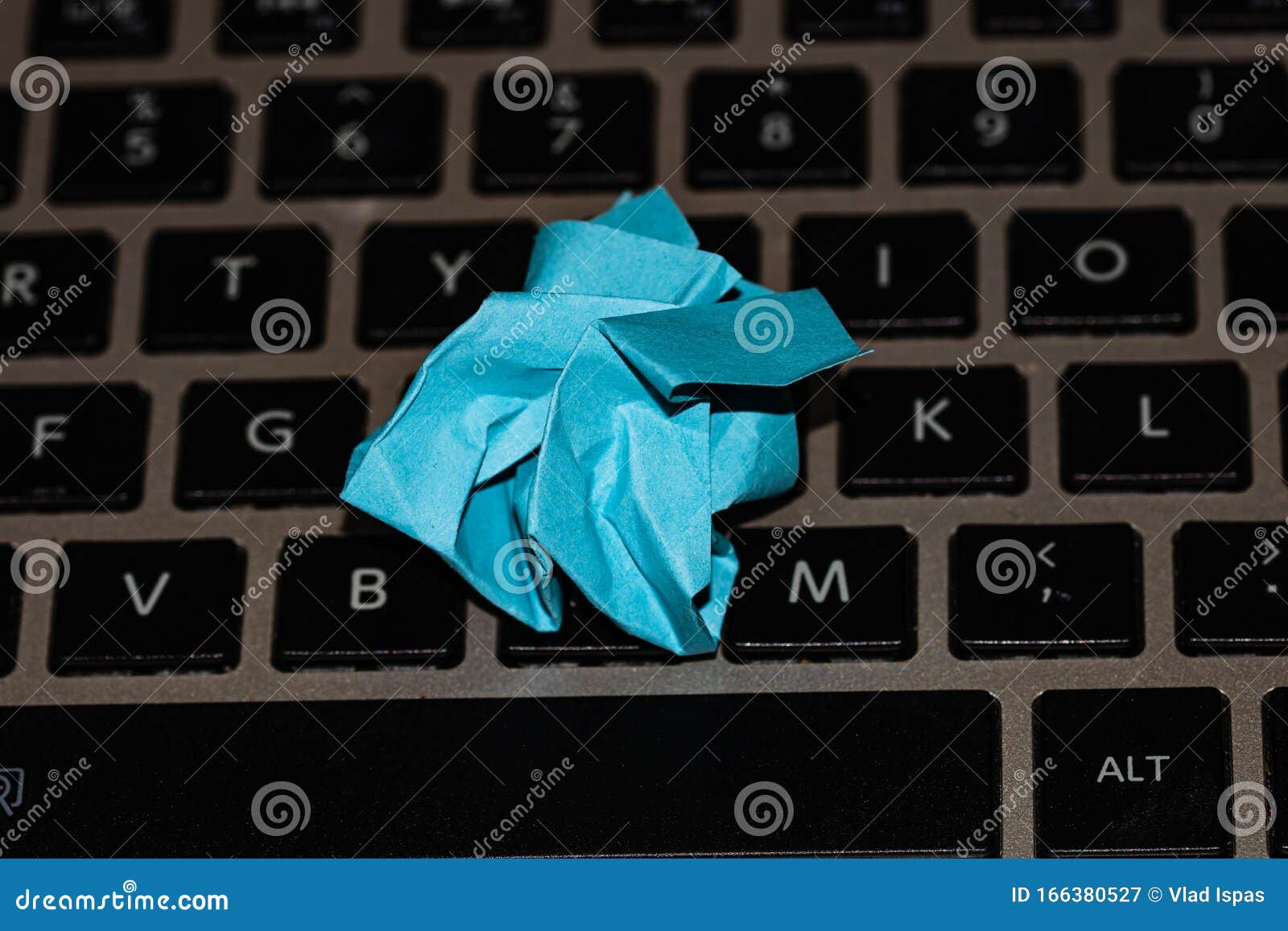 Crumpled Sticky Note on Keyboard. Blue Crumpled Post it Stock Image ...