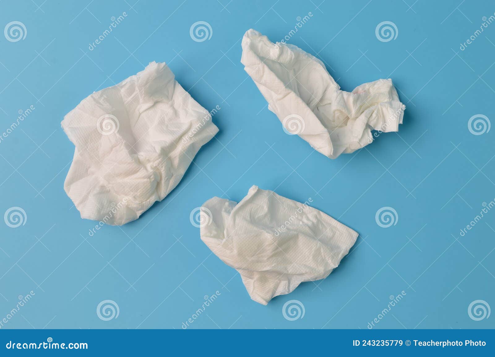 Crumpled Tissue Paper Isolated on a Blue Background Stock Image - Image ...