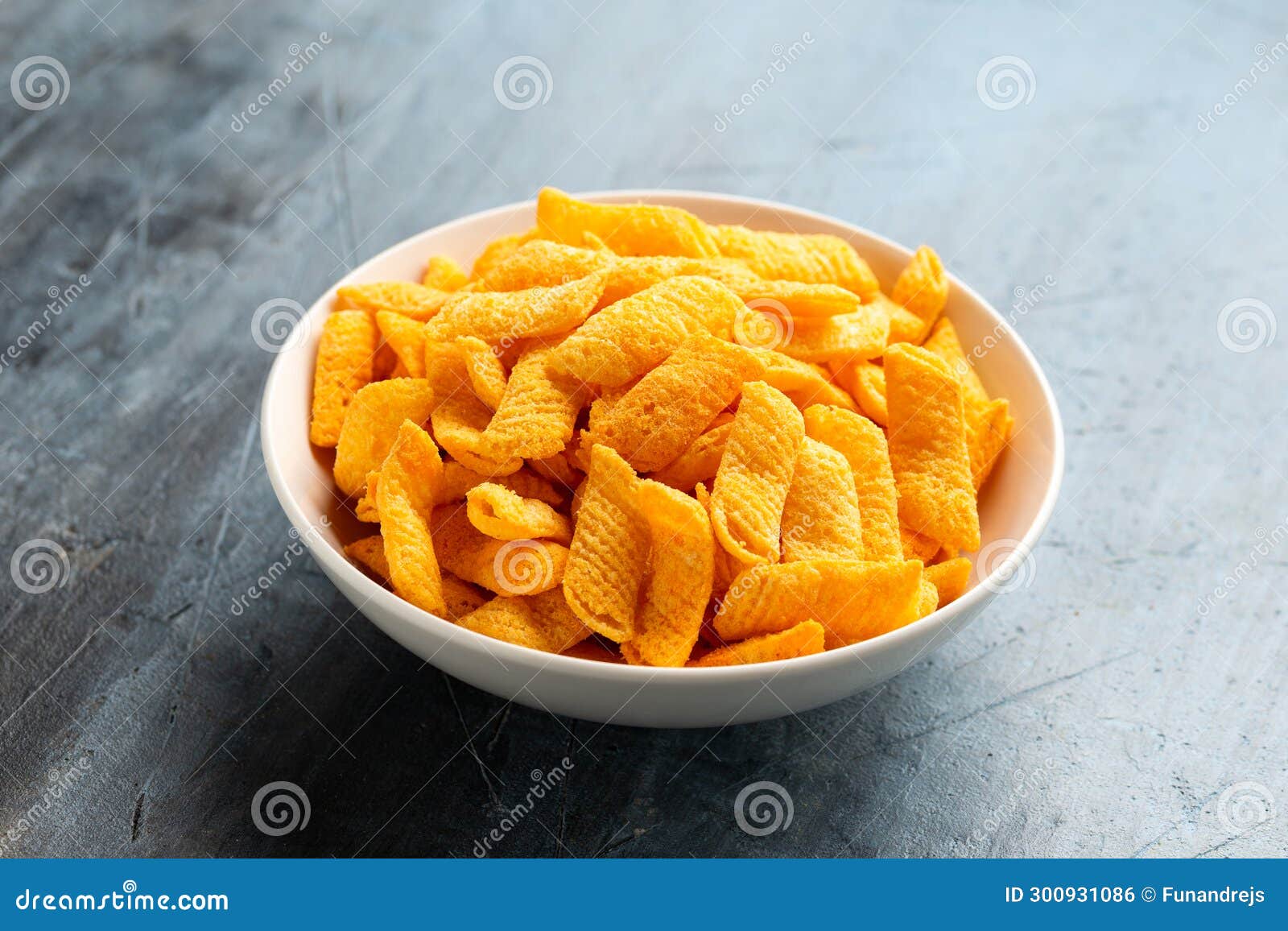 Crunchy Nacho Cheese Corn Snack in White Bowl Stock Photo - Image of ...