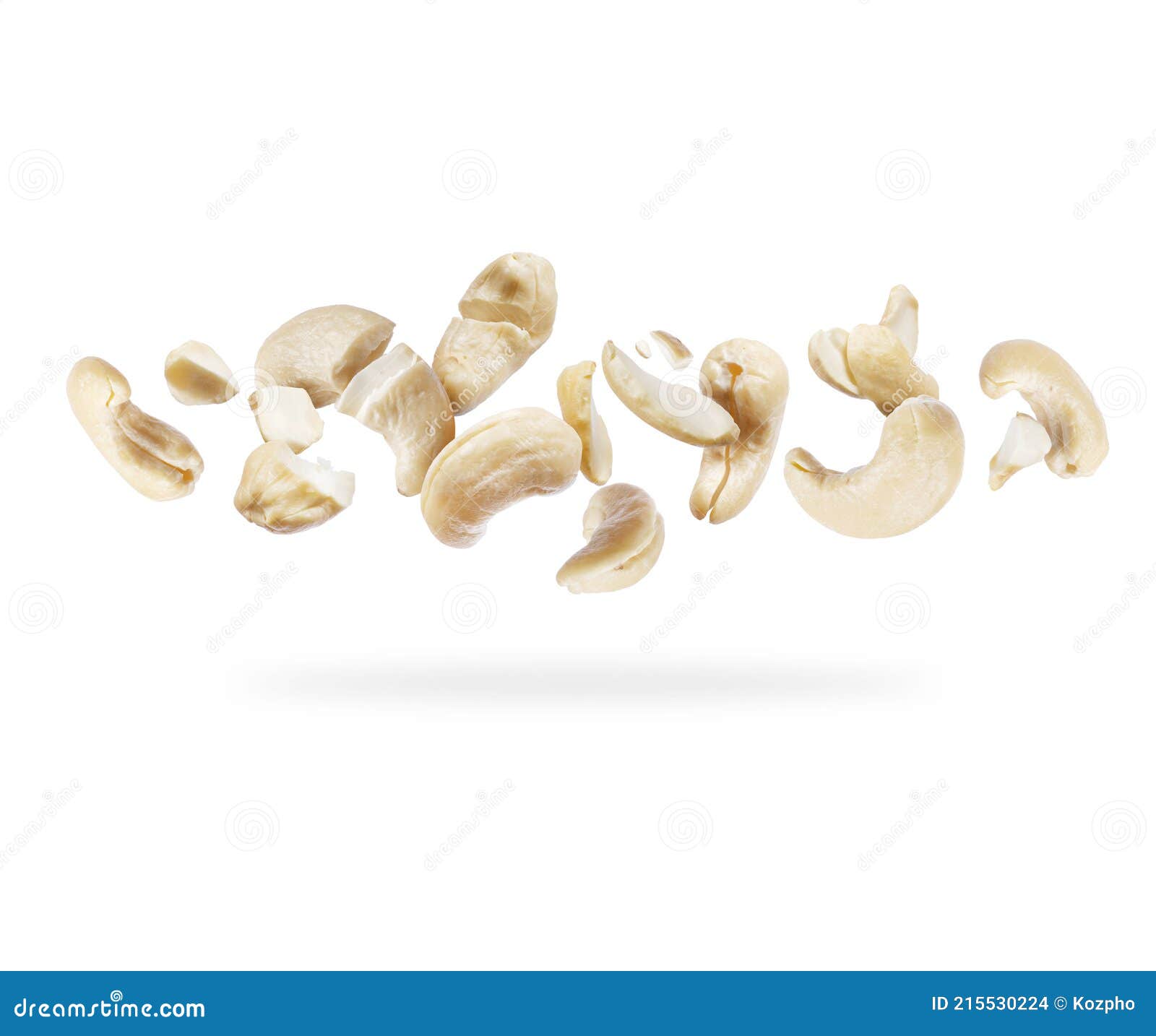 Crushed Cashew Nuts Close-up Hovered in White Space Stock Photo - Image ...
