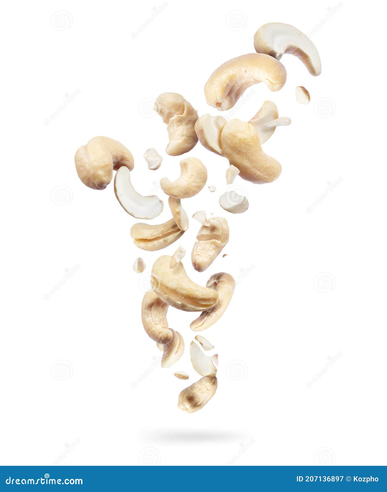 Crushed Cashew Nuts into Many Pieces in the Air Isolated on White ...
