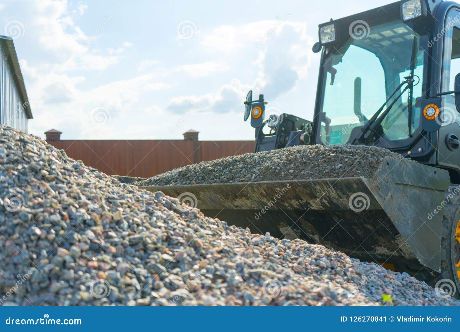 Crushed Granite. Bucket Typed by the Loader Stock Image - Image of ...
