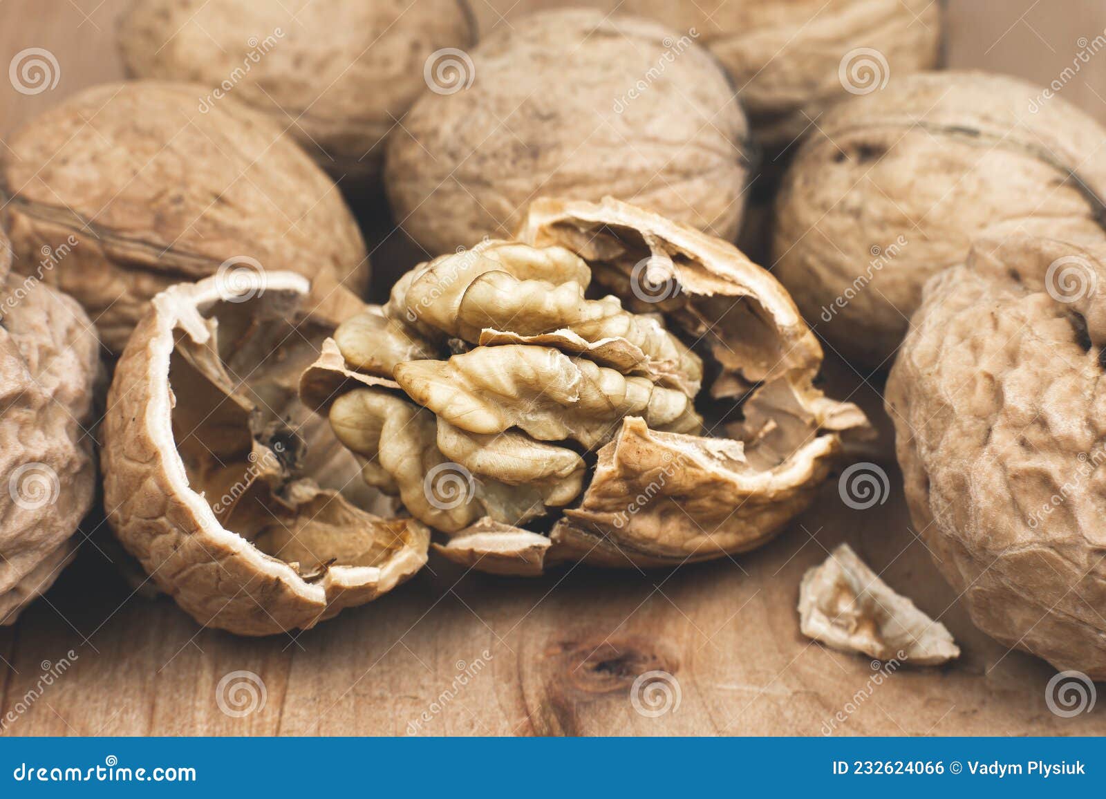 Crushed Walnut on the Wood Background. Close Up Stock Photo - Image of ...