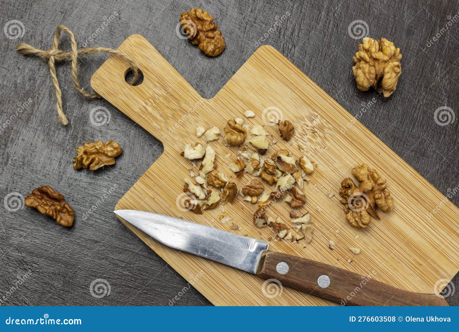 Crushed Walnuts and Knife on Cutting Board. Walnut Shell and Walnut ...