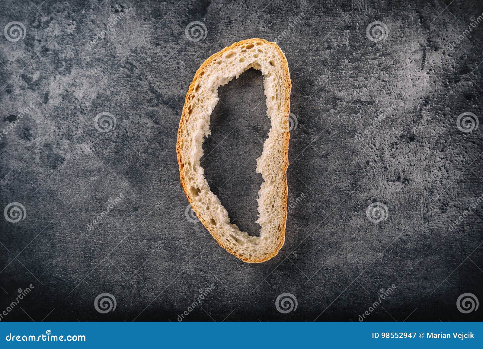 Crust of Bread on Concrete Board. Toned Image Stock Image - Image of ...