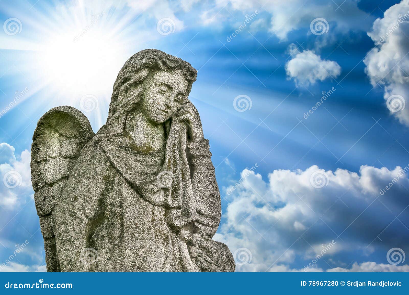 Crying Angel. Sunlight and Clouds Background. Stock Photo - Image of ...