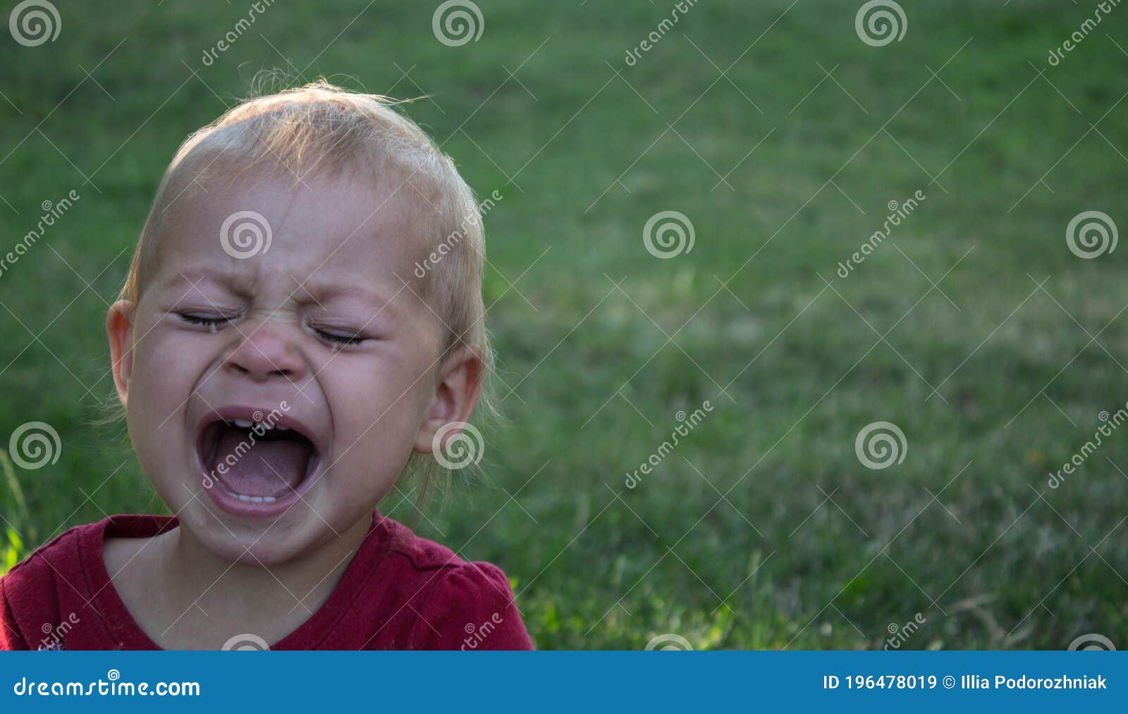 A Crying Baby in the Backyard Tears Stock Image - Image of baby ...
