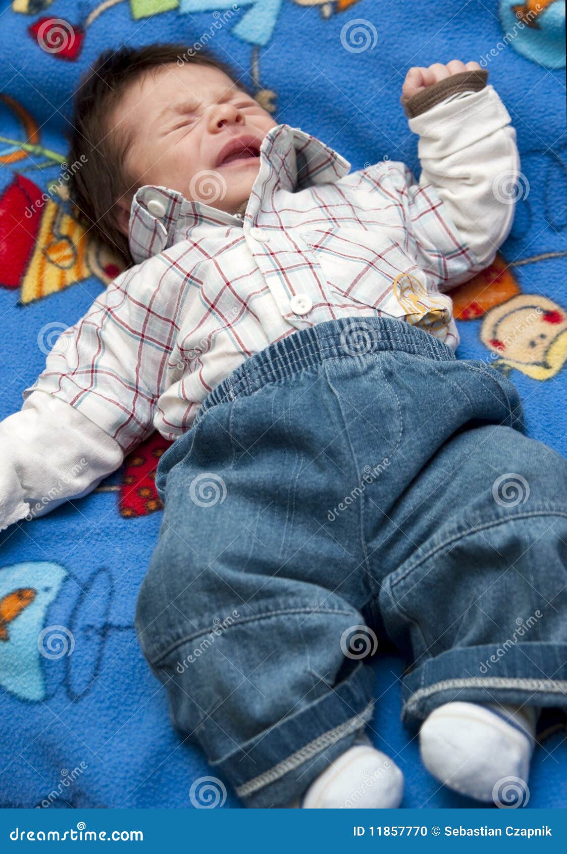 Crying baby boy stock photo. Image of blanket, colorful - 11857770
