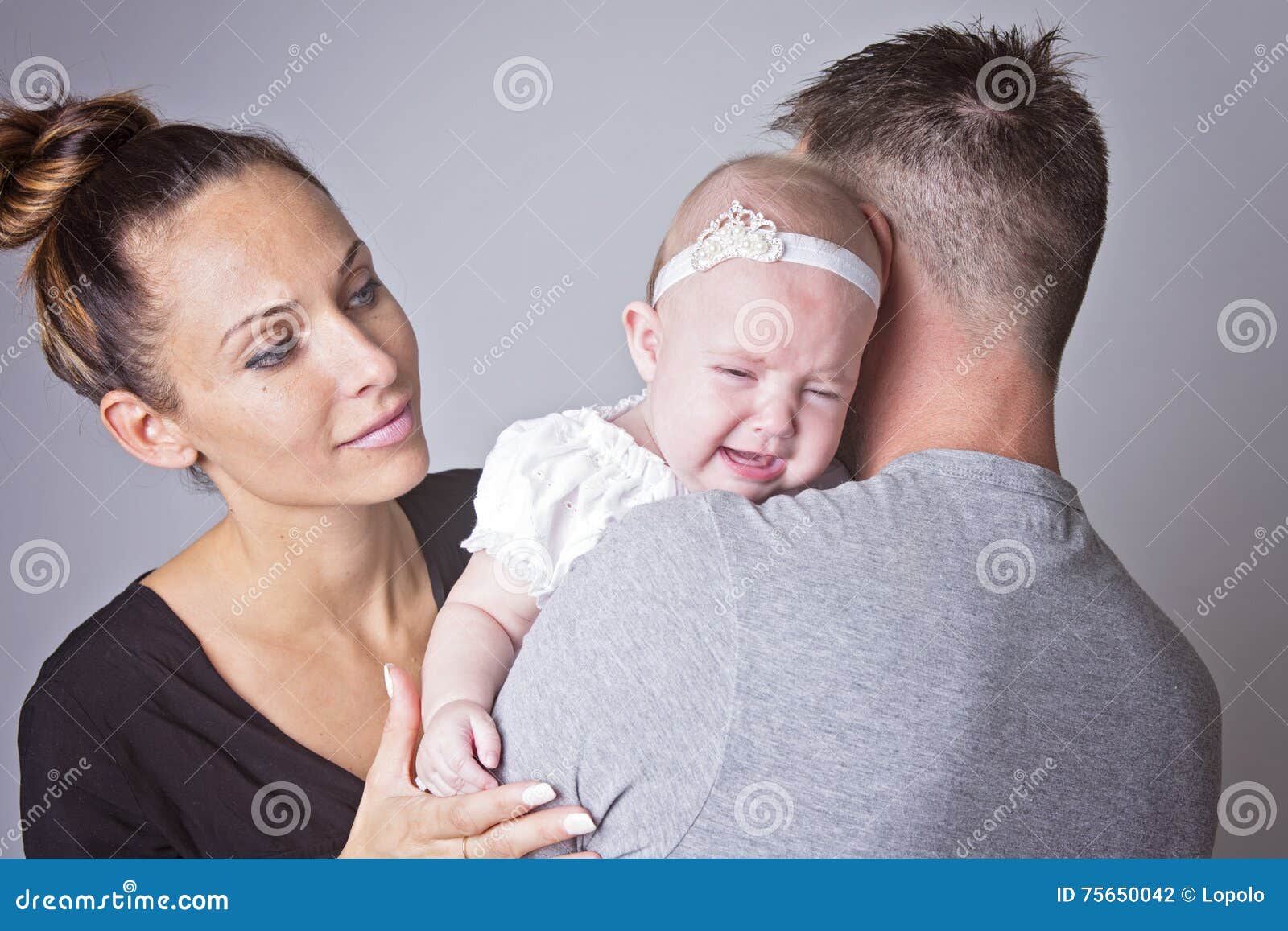 Crying baby stock photo. Image of hand, bonding, childhood - 75650042