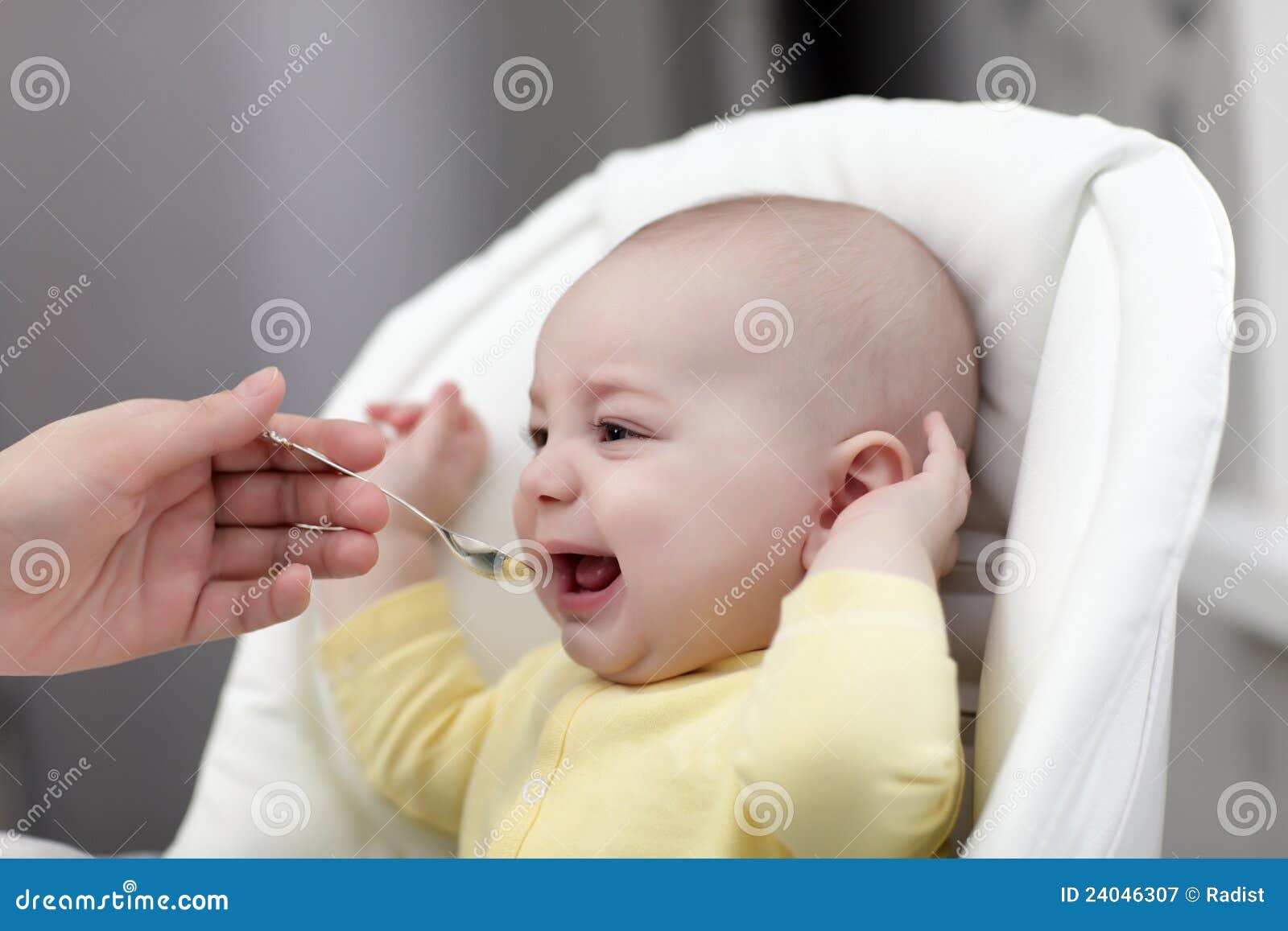 Crying baby with food stock image. Image of child, childhood - 24046307