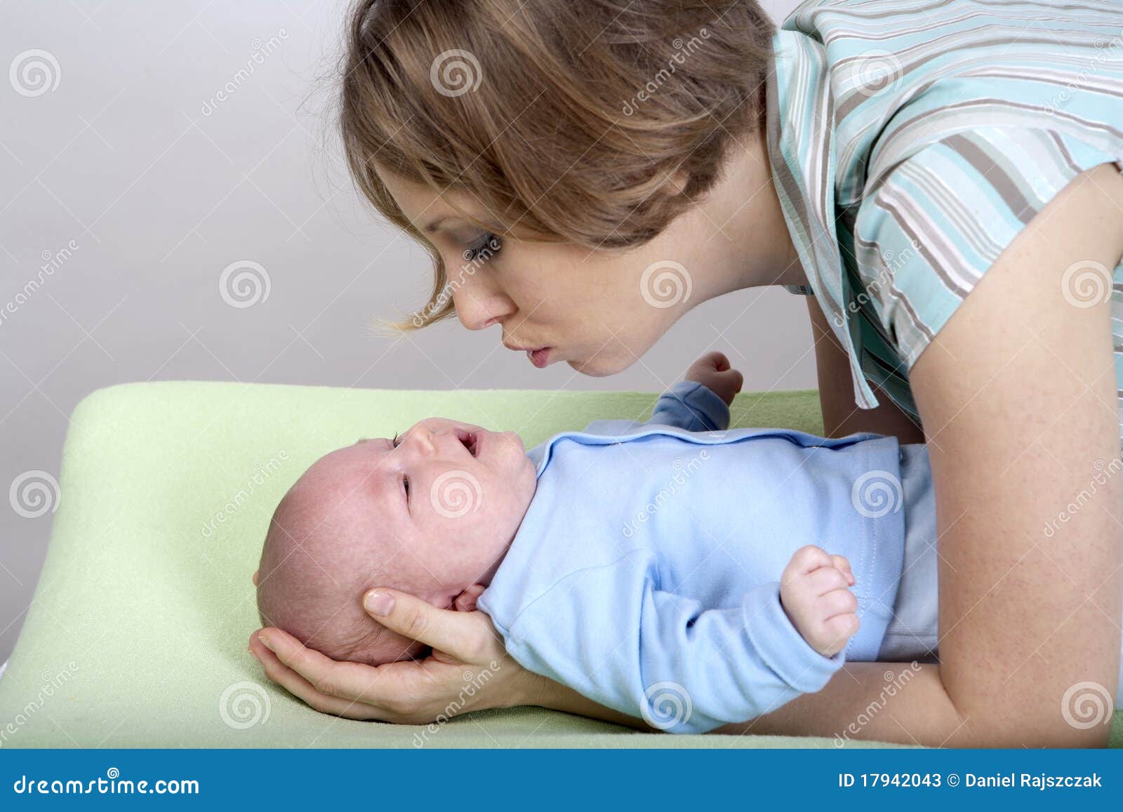 Crying baby with mother stock image. Image of infant - 17942043