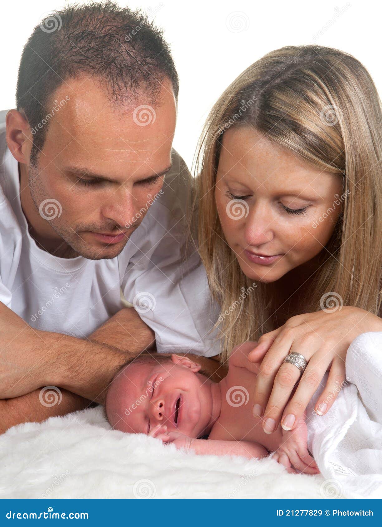 Crying baby with parents stock image. Image of beautiful - 21277829