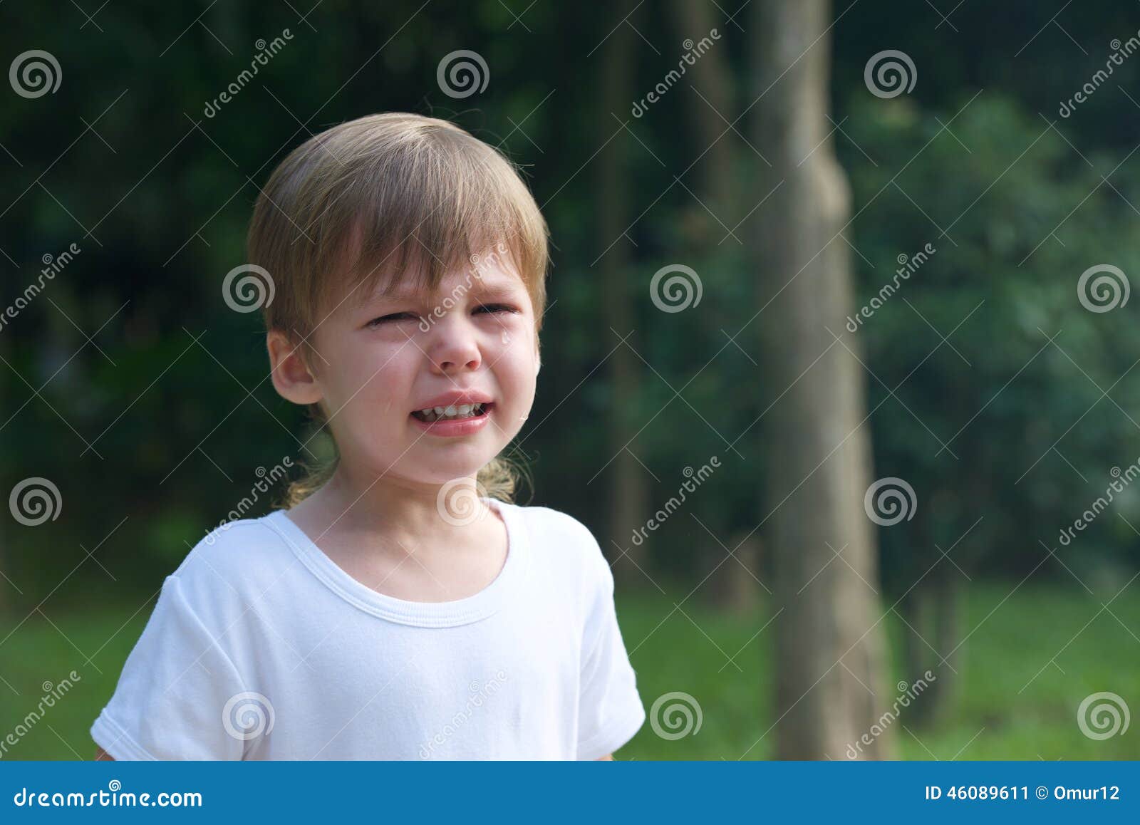 Crying boy in the park stock image. Image of adorable - 46089611