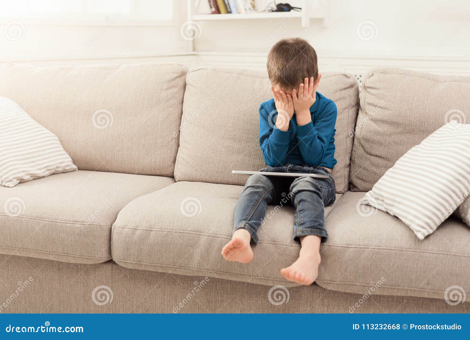 Crying Boy with Digital Tablet at Home Stock Photo - Image of leisure ...
