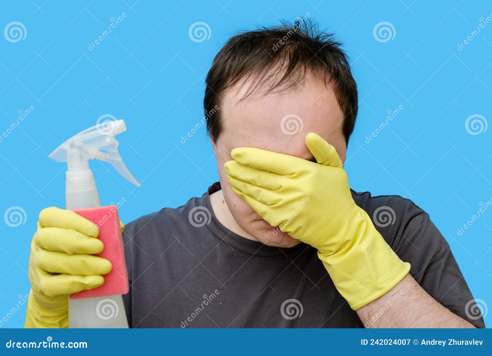 Crying Cleaner Man in Yellow Gloves, Portrait on Studio Blue Background ...