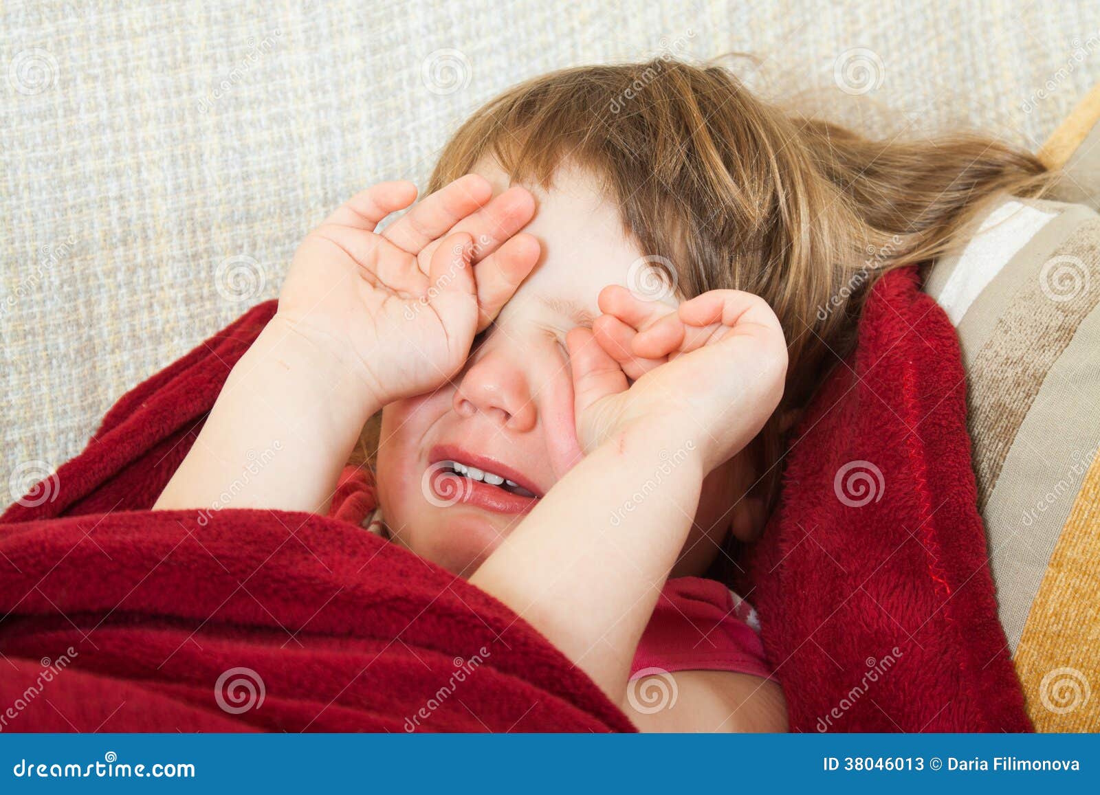 Crying girl on sofa stock image. Image of distressed - 38046013