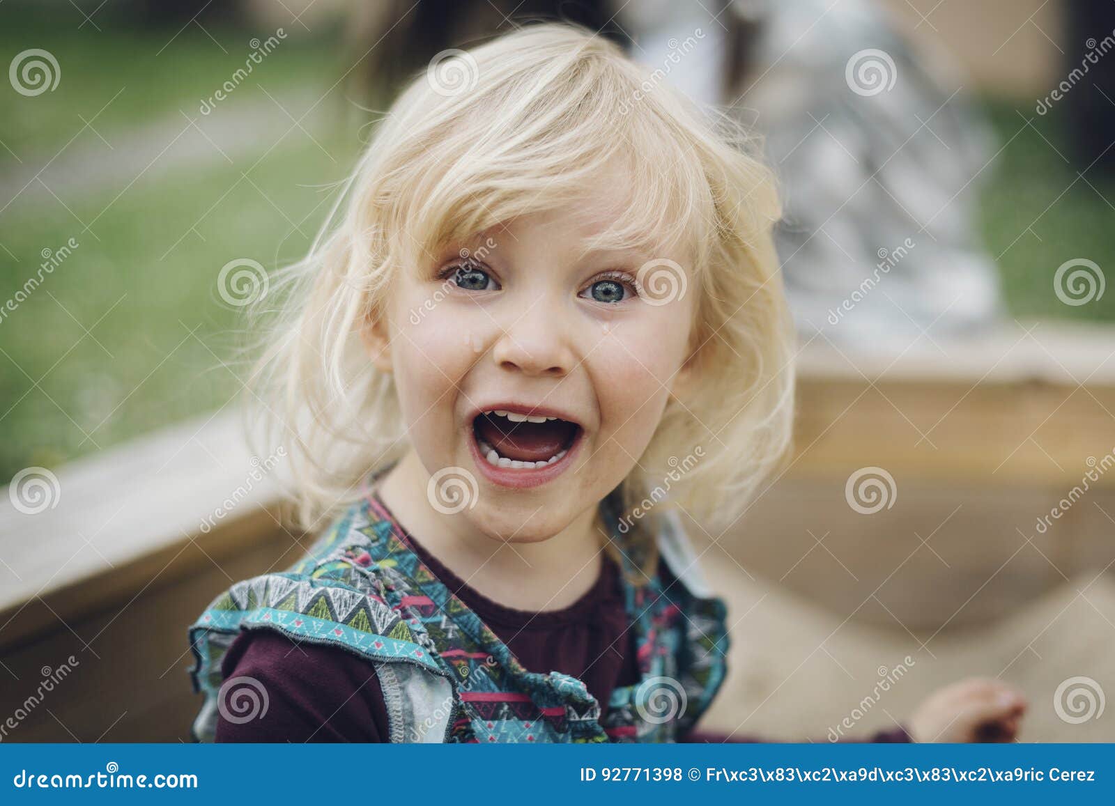 Crying little blond girl stock photo. Image of emotion - 92771398