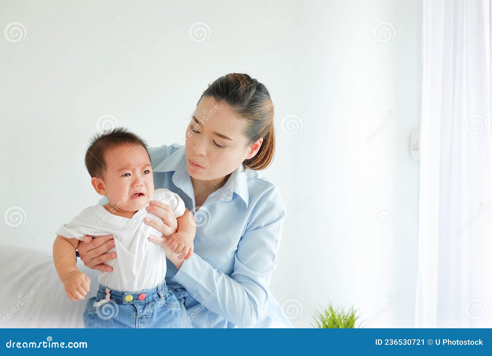 Crying Little Boy Being Consoled By Mother Royalty-Free Stock ...