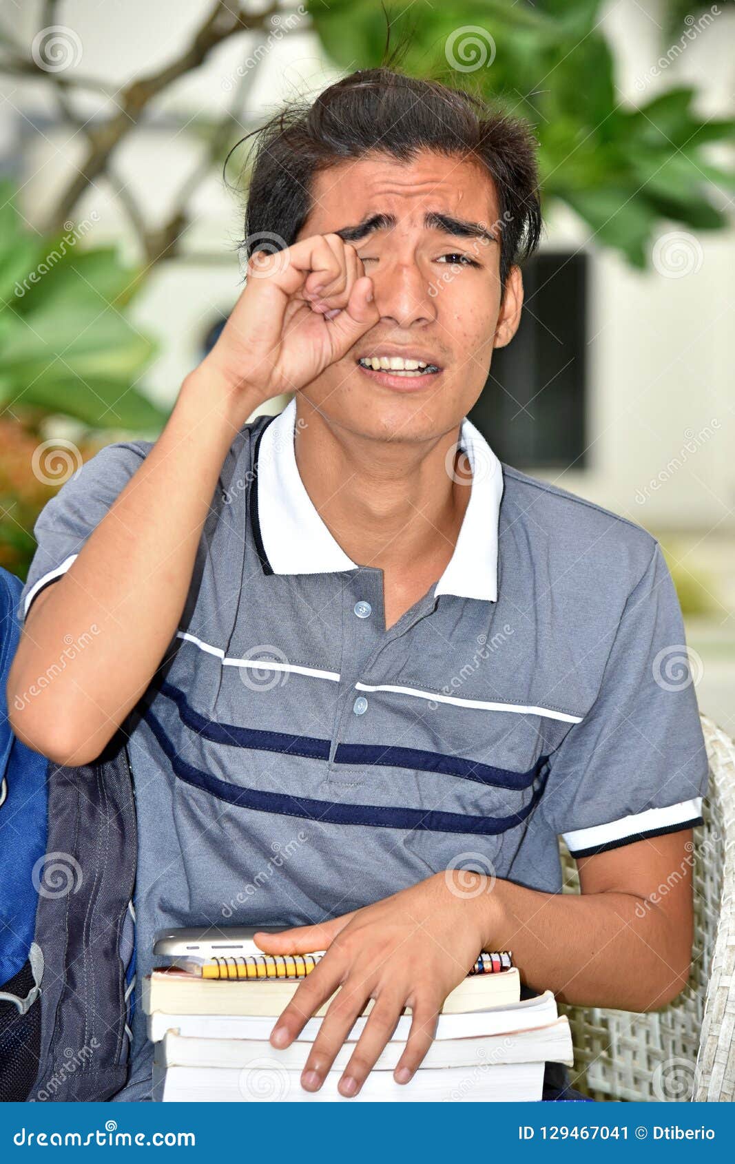 Crying Male Student with Notebooks Stock Image - Image of male ...
