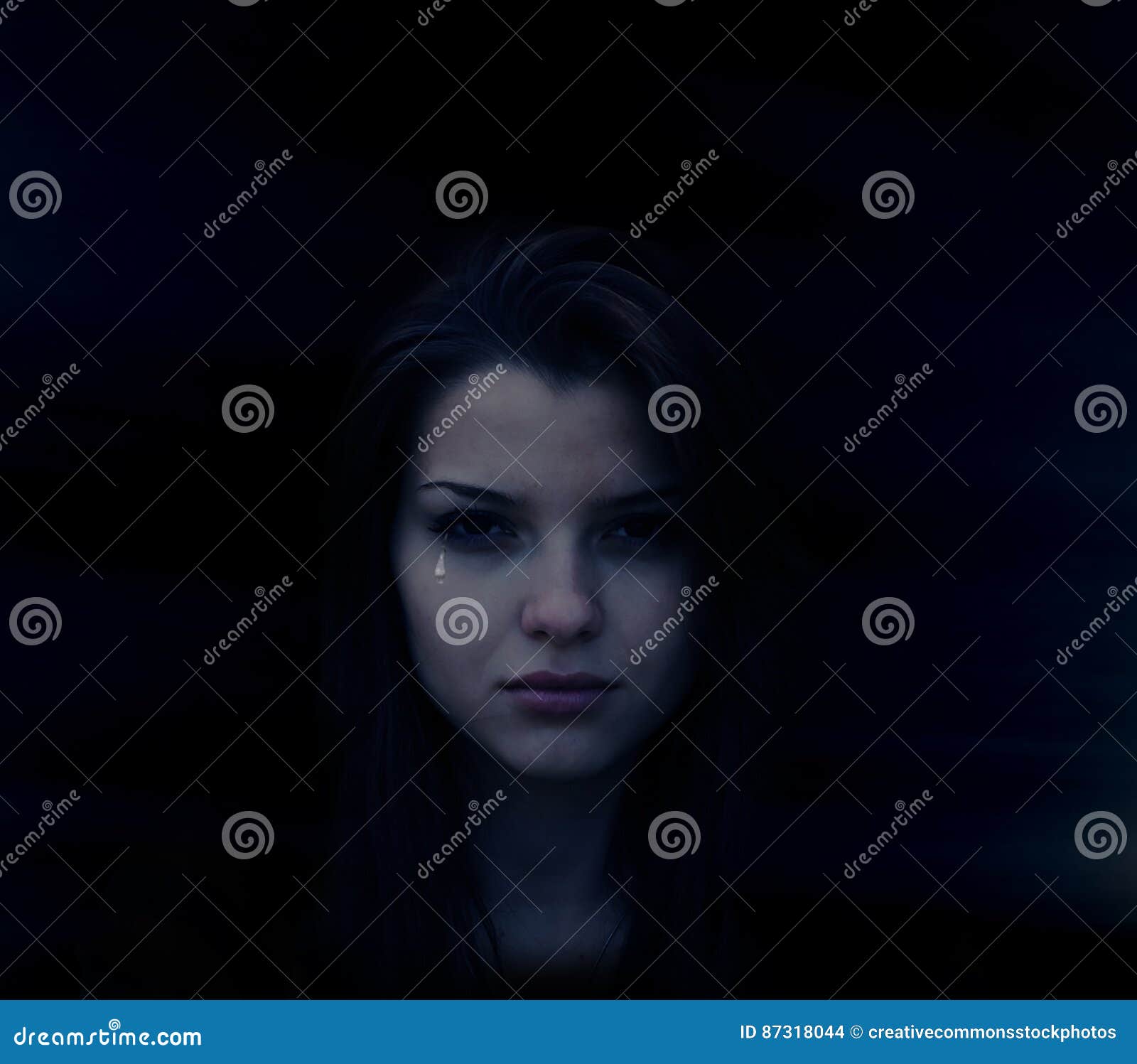 Crying Young Woman In Shadows Picture. Image: 87318044