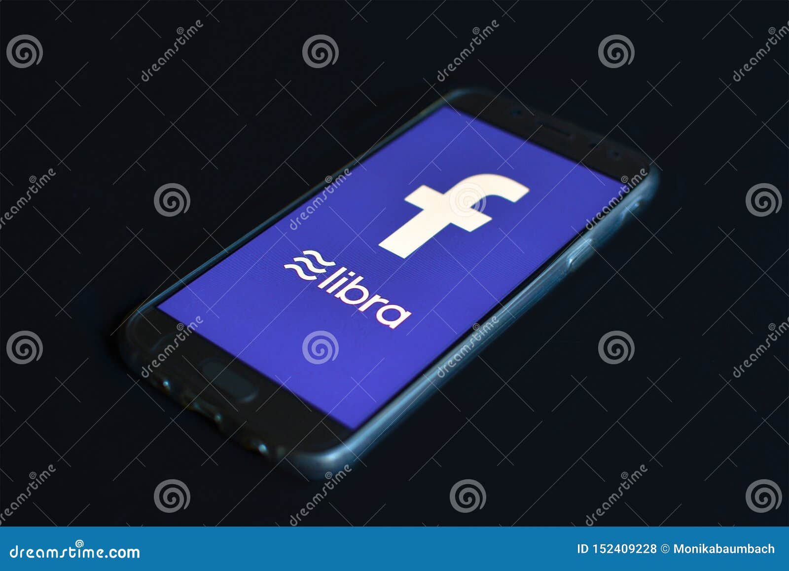 Cryptocurrency Libra Concept Mobile Phone with Libra and Facebook Logo ...