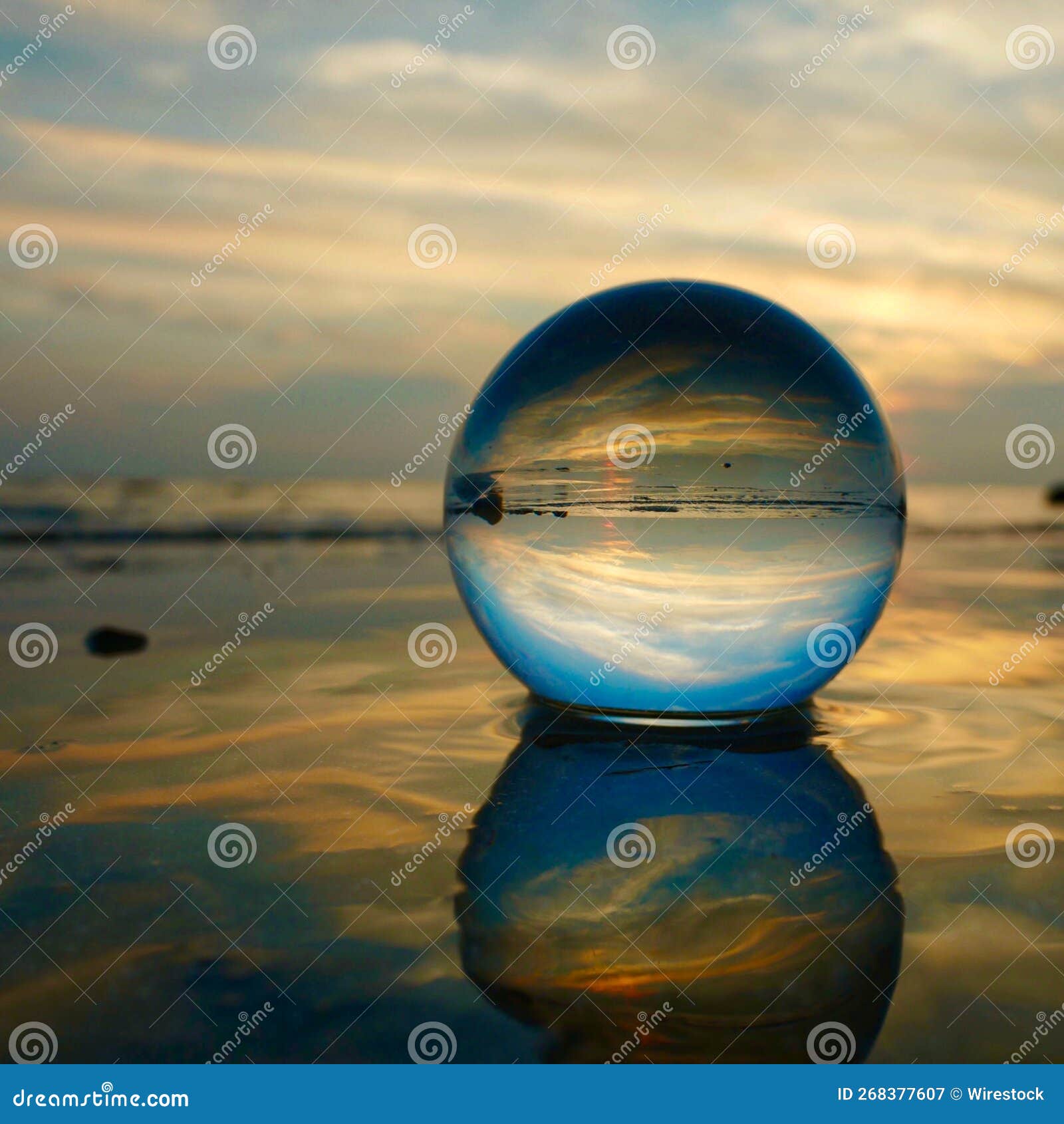 Crystal Ball on the Beach with Reflections Stock Image - Image of ball ...