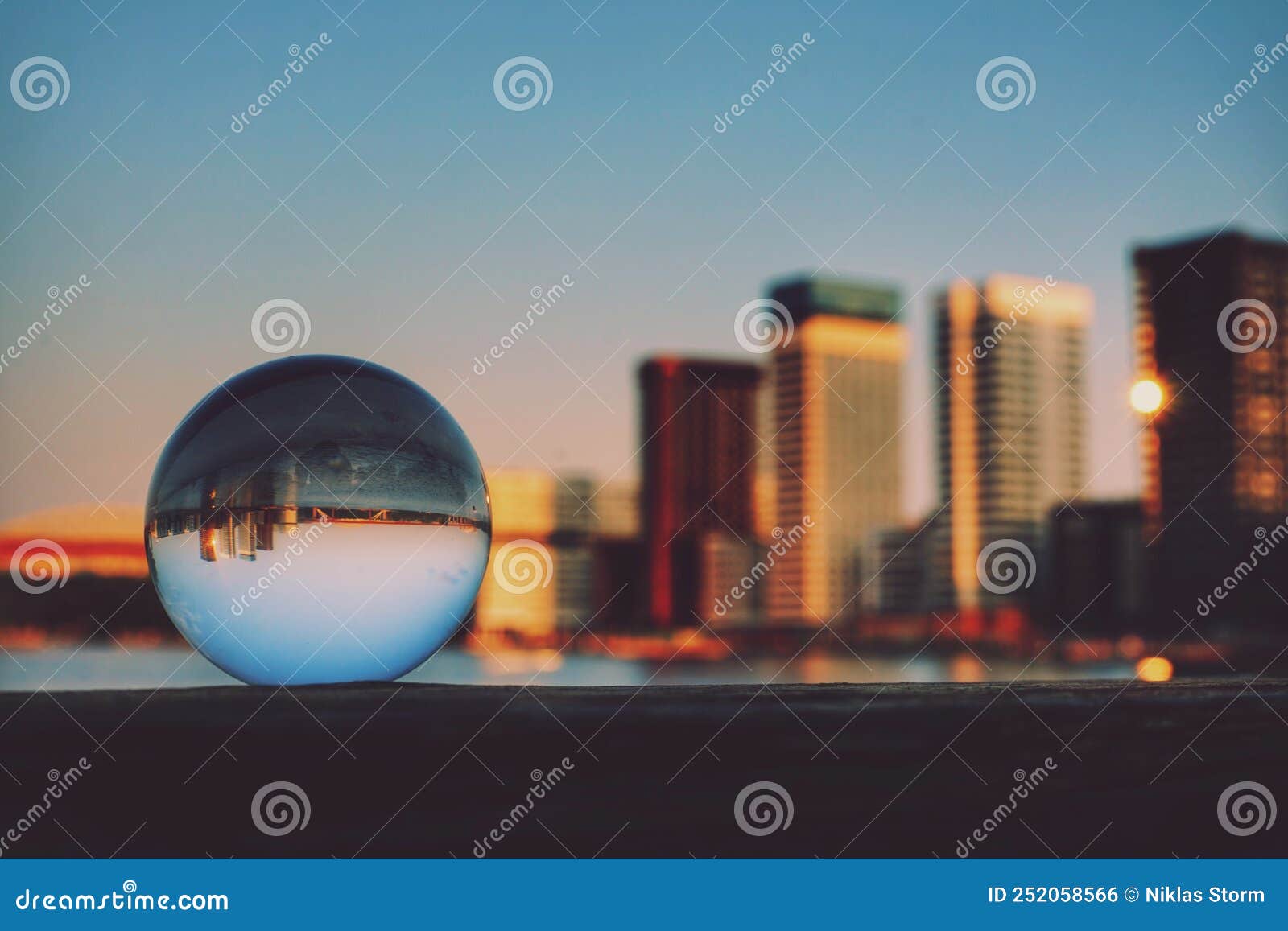 Crystal Ball in Front of Skyscrapers in the Evening Stock Photo - Image ...
