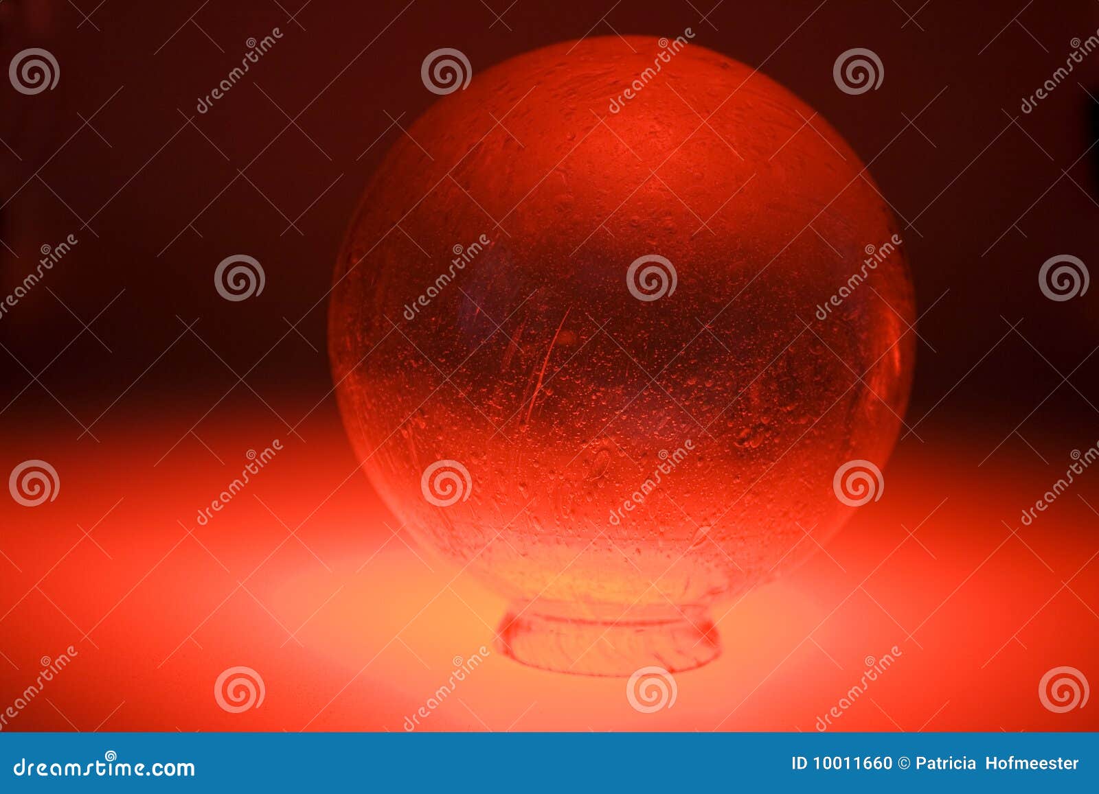 Crystal ball in red light stock photo. Image of transparent - 10011660