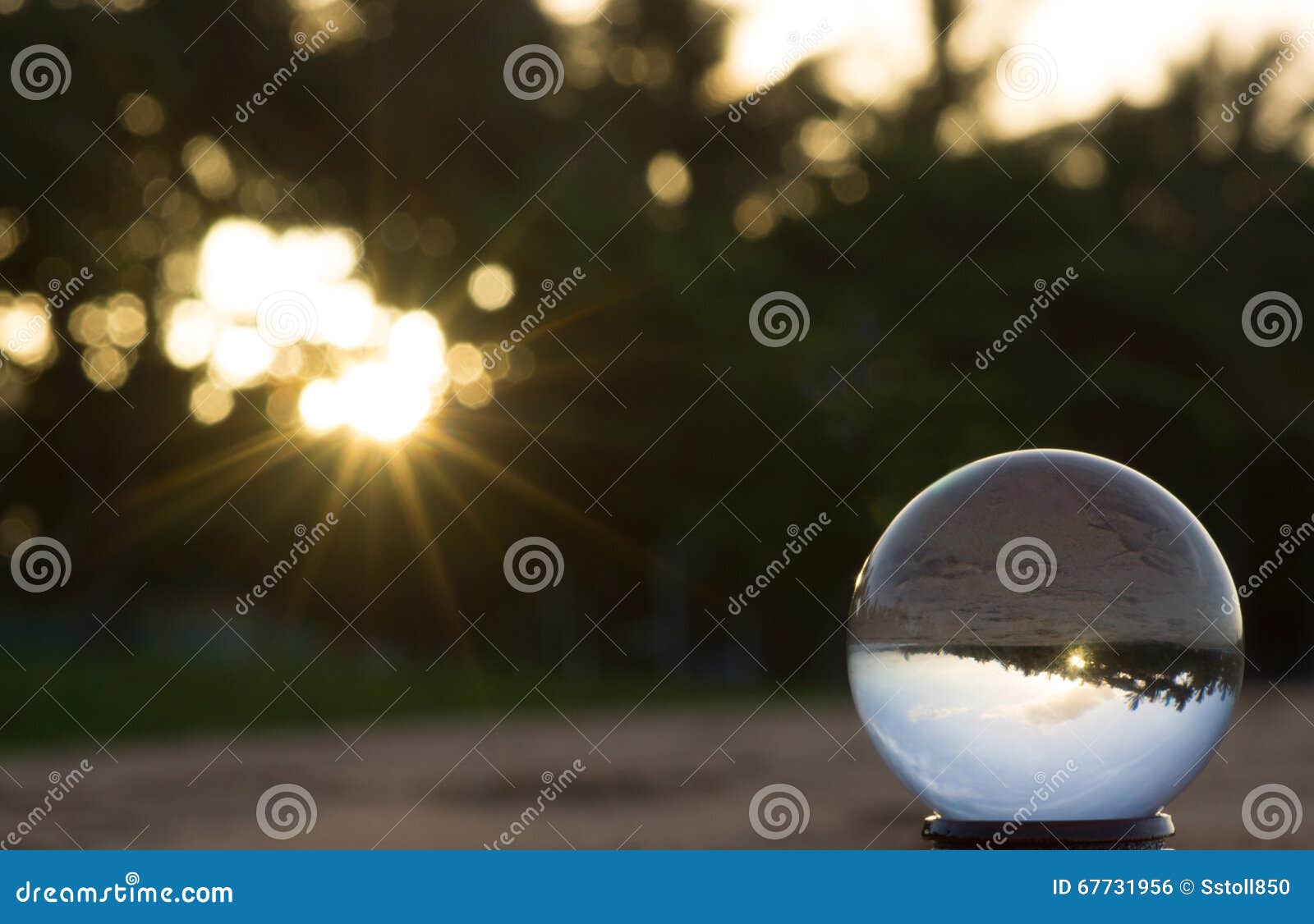 Crystal Ball with Sun Flare and Beach Reflection Stock Photo - Image of ...