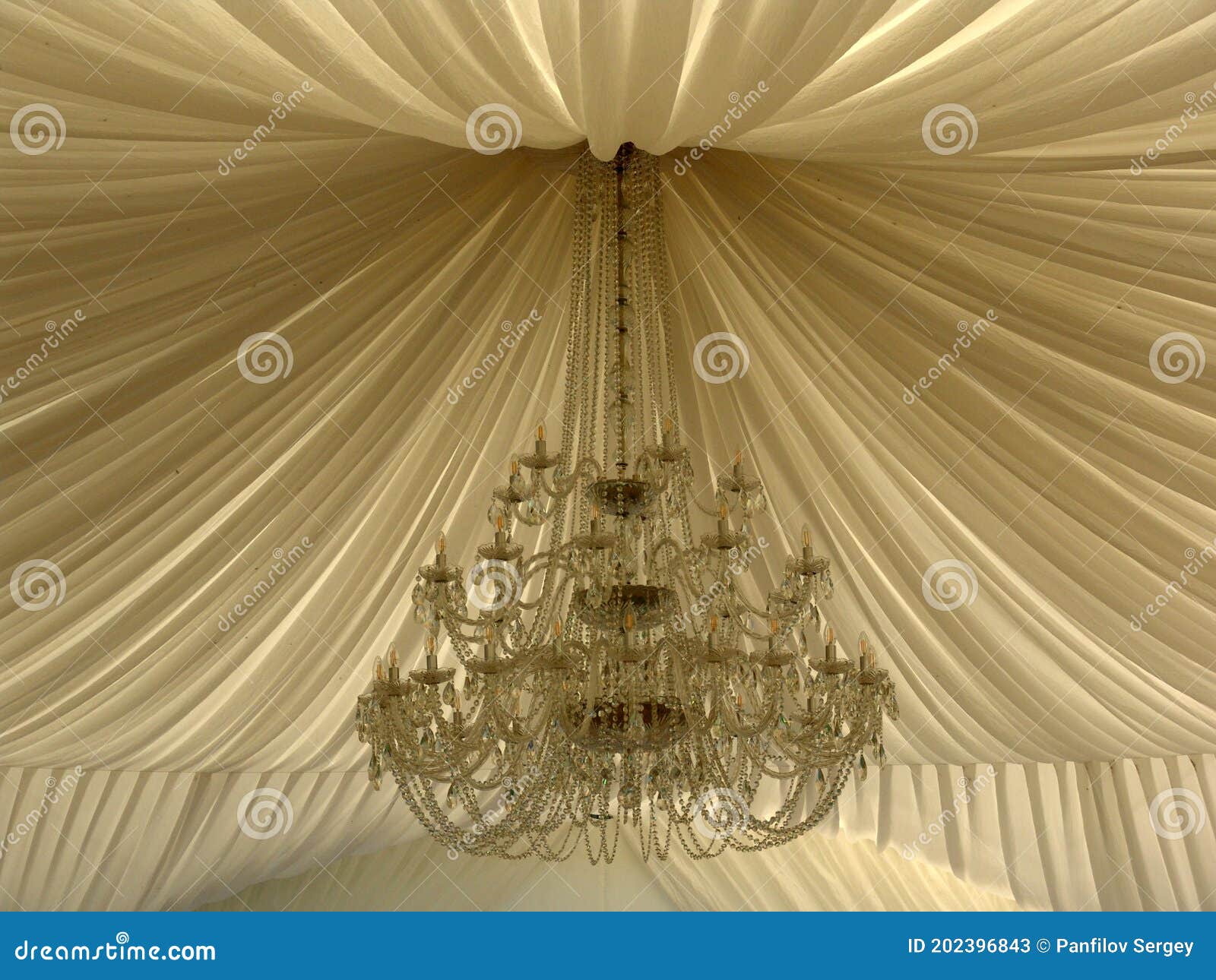 Crystal Chandelier in the Center of the Canopy Stock Image - Image of ...