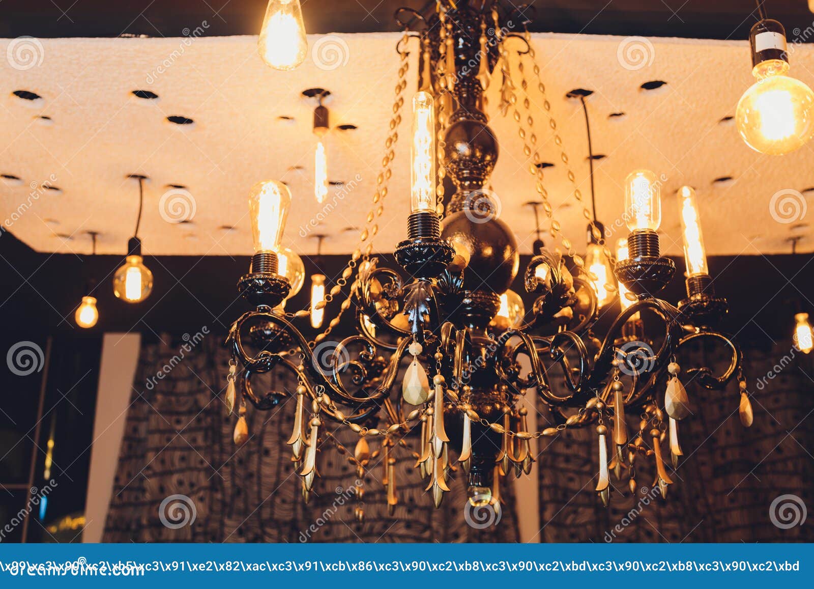 Crystal Chandelier Shines Hanging from the Ceiling in the Room. Stock ...