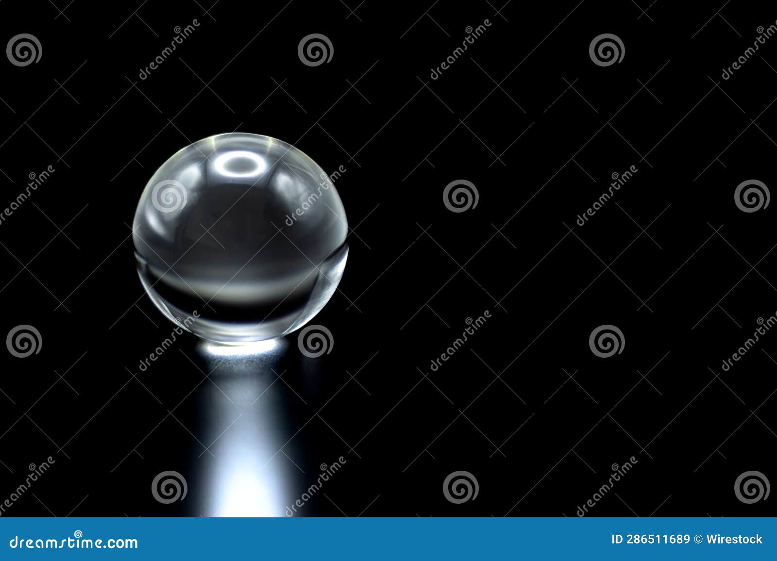 Crystal Clear Glass Orb Sitting on a Solid Black Backdrop Stock Image ...