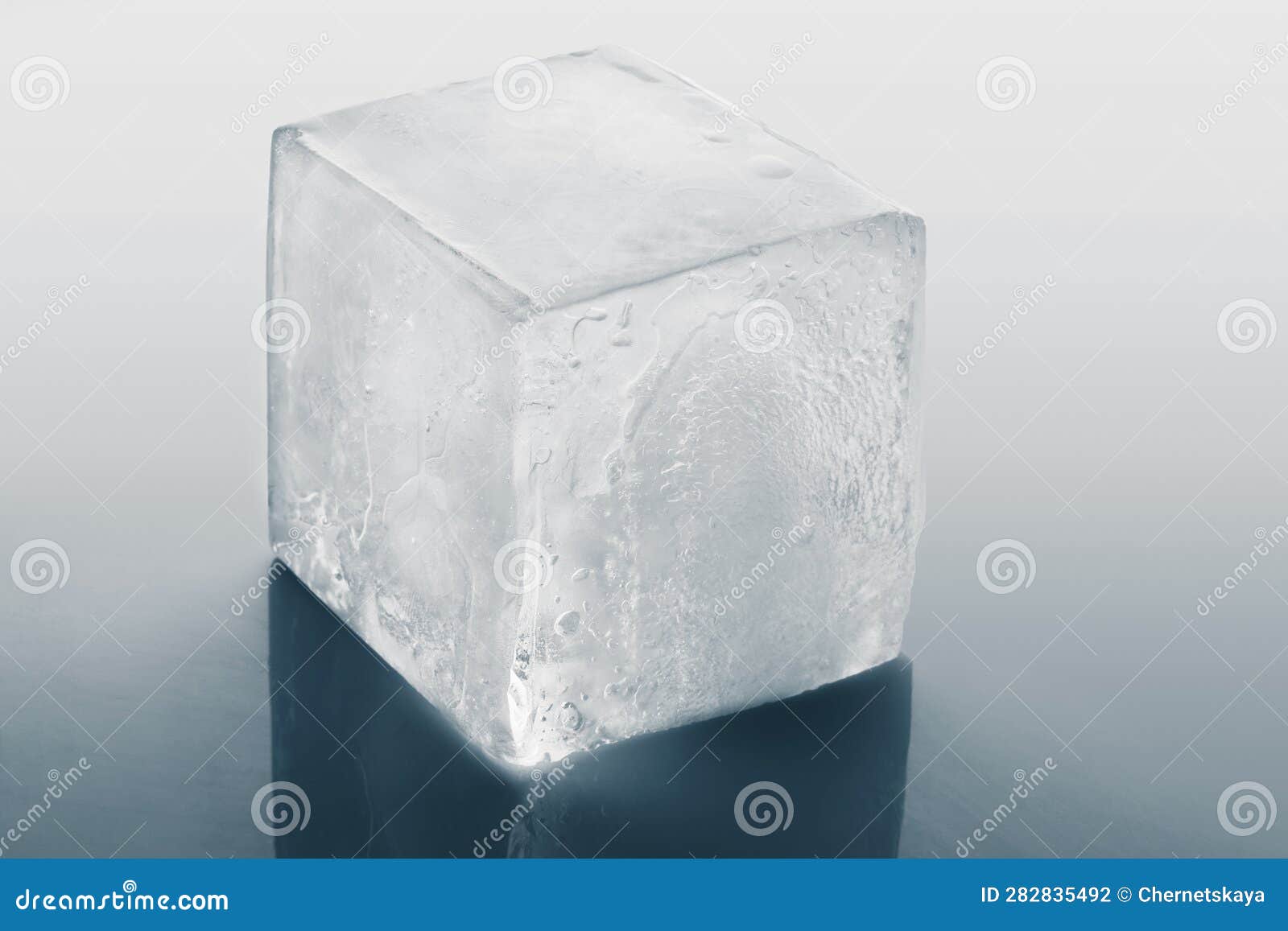 Crystal Clear Ice Cube on Light Grey Background Stock Photo - Image of ...