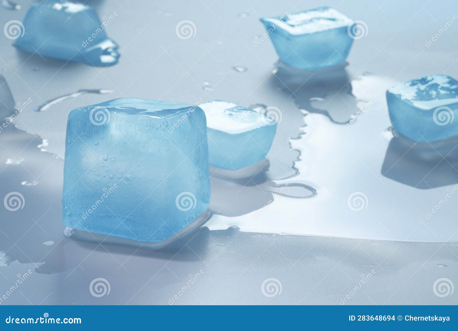 Crystal Clear Ice Cubes on Light Blue Background Stock Photo - Image of ...