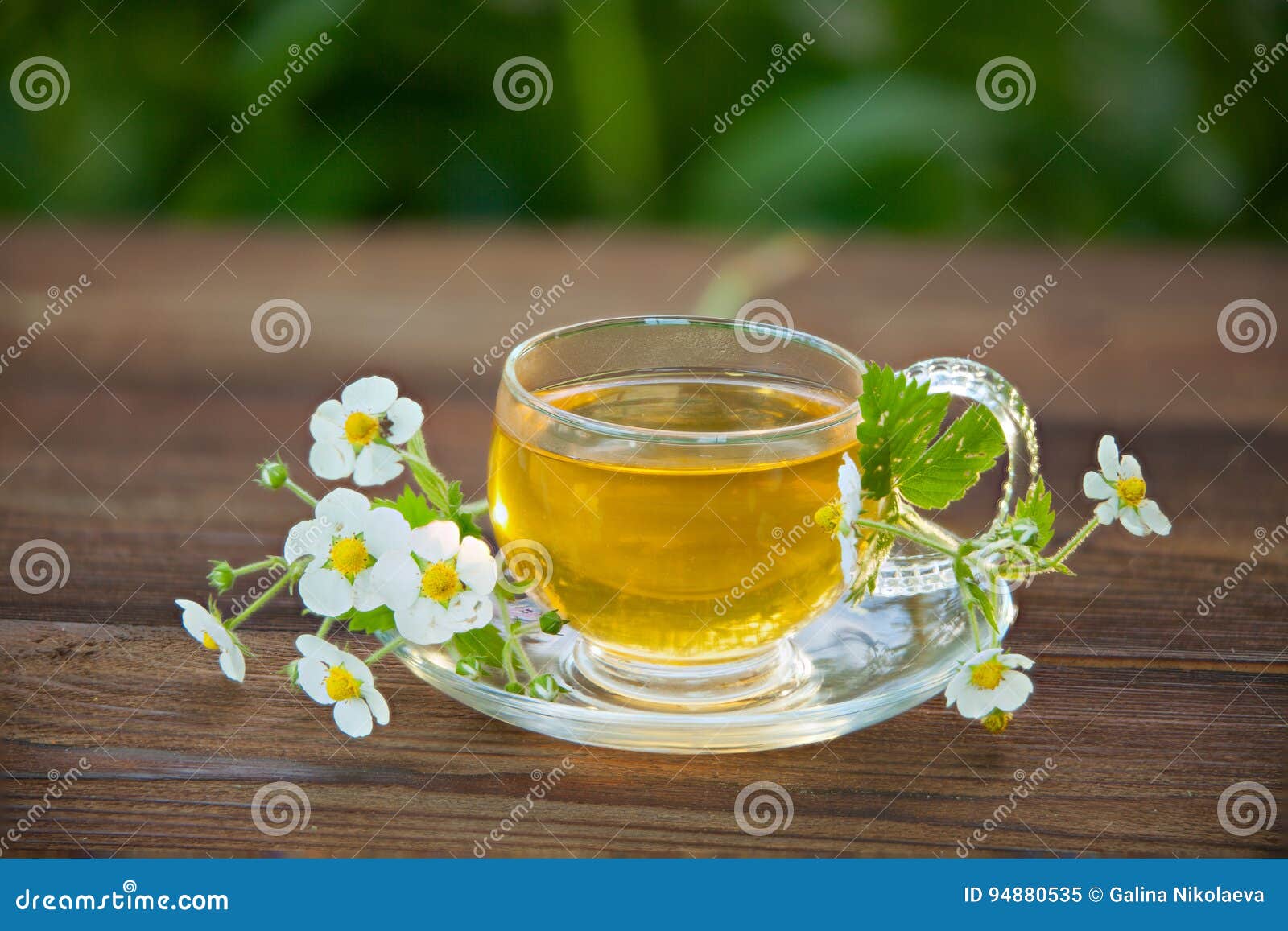 Crystal Cup with Green Tea on Table Stock Image - Image of glass, table ...