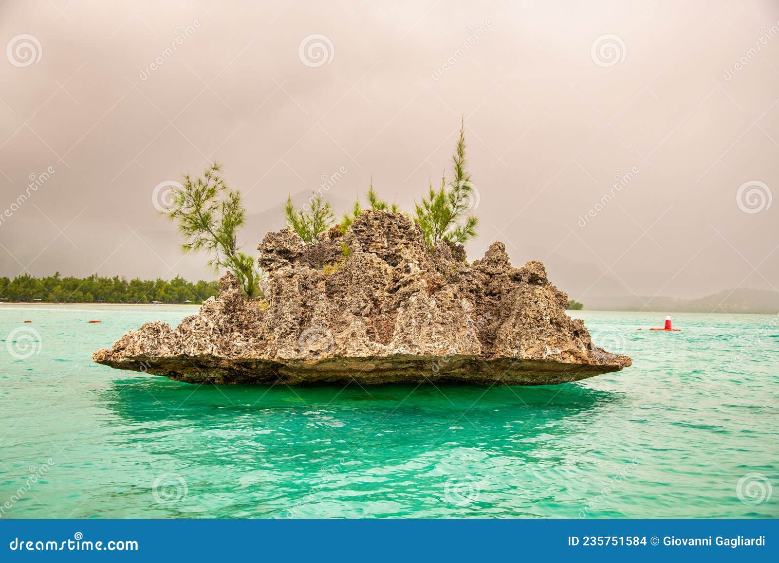 Crystal Rock is an Isolated Rock in Front of Mauritius Coastline Stock ...