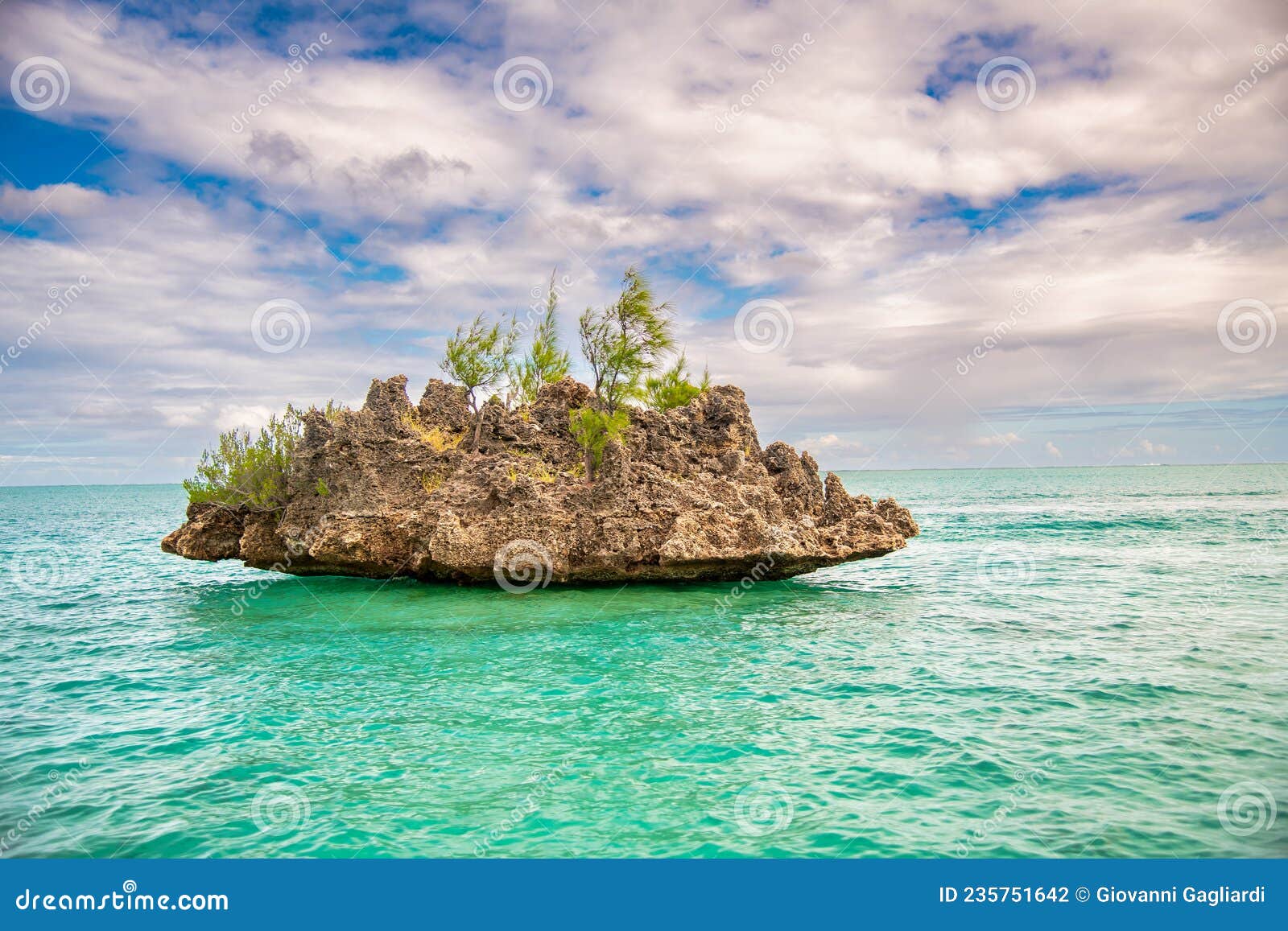Crystal Rock is an Isolated Rock in Front of Mauritius Coastline Stock ...