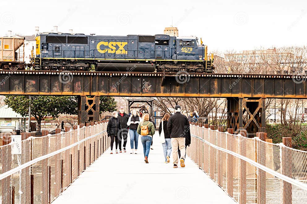 CSX Locomotive Engine Pulling a Coal and Freight Train on a Bridge ...