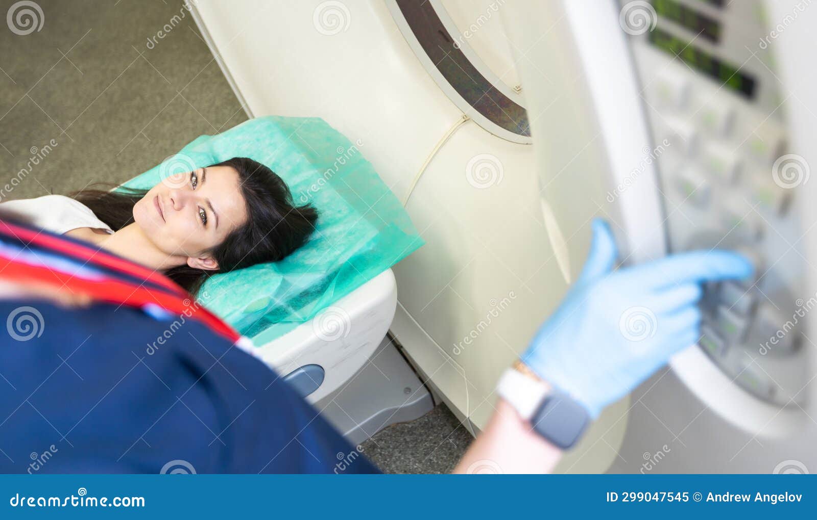 CT Scan Technologist Overlooking Patient in Computed Tomography Scanner ...